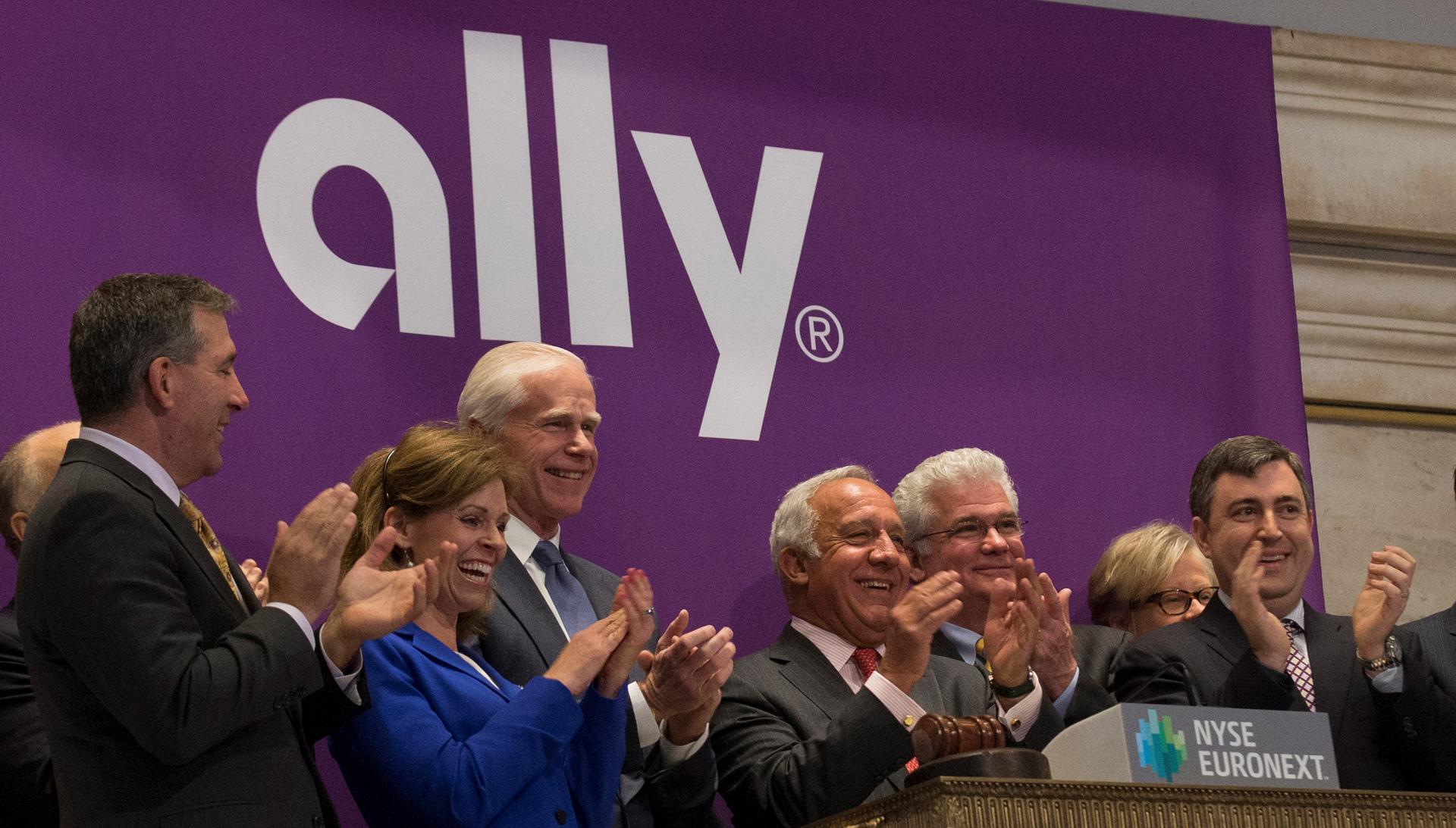 Ally Financial executives ring the opening bell to celebrate its IPO at ...